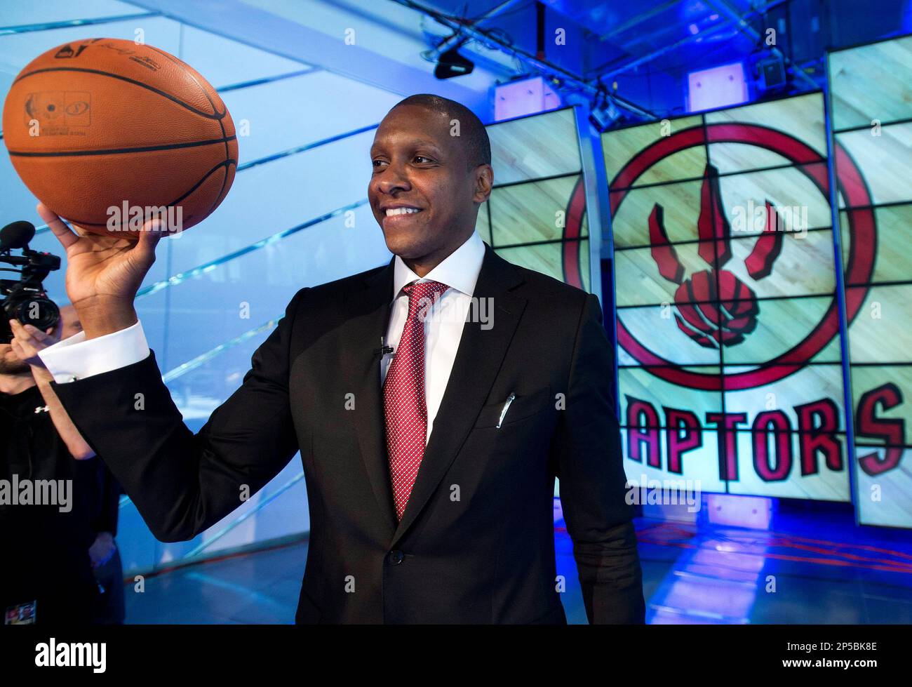 Toronto Raptors new general manager Masai Ujiri poses for photographers ...