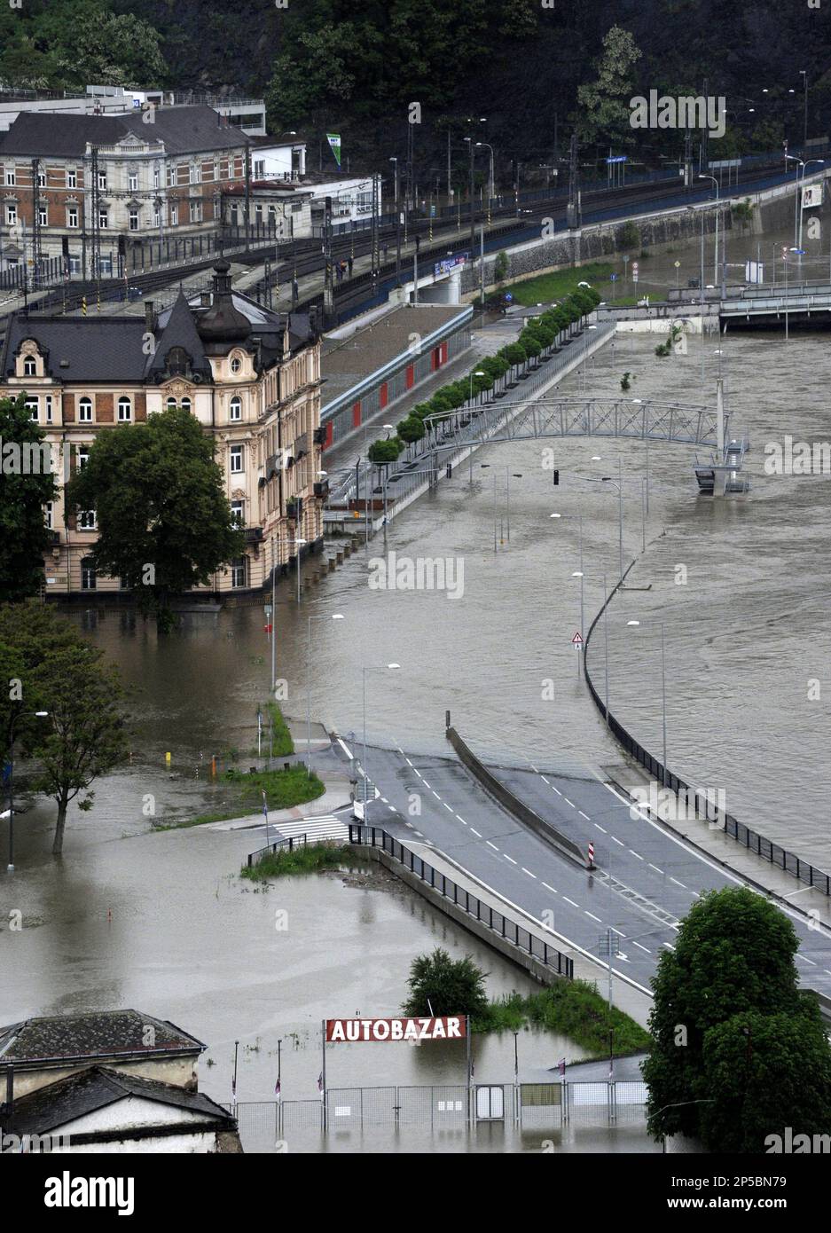 A bank highway is flooded with the swollen Elbe river in Usti nad Labem ...