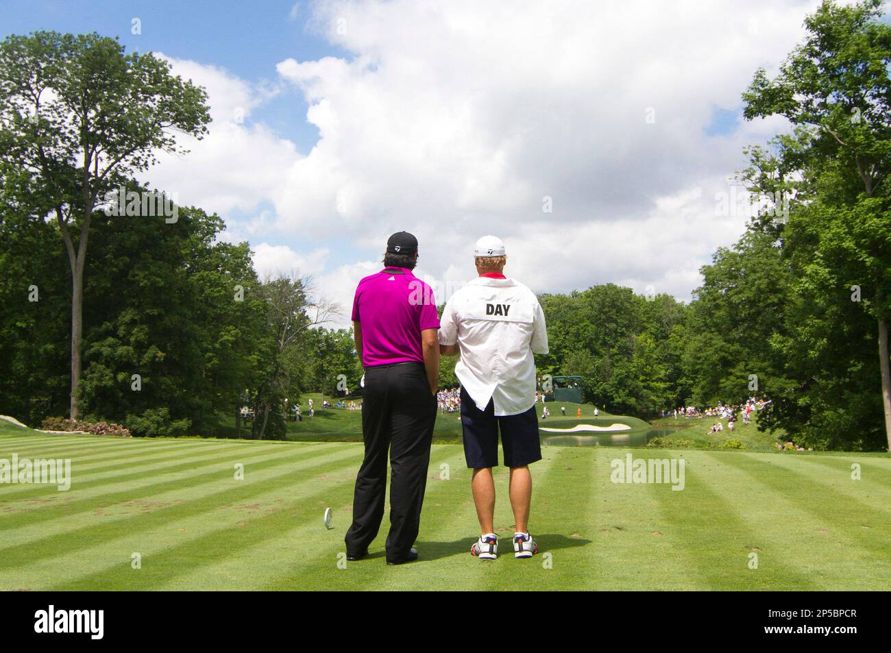 June 2, 2013: Jason Day and his caddie Colin Swatton discuss their ...