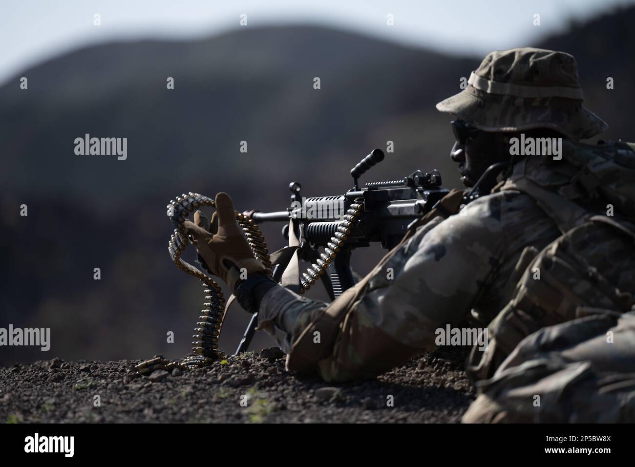 U.S. Army Specialist Terrence Thomas, a squad automatic weapon gunner ...