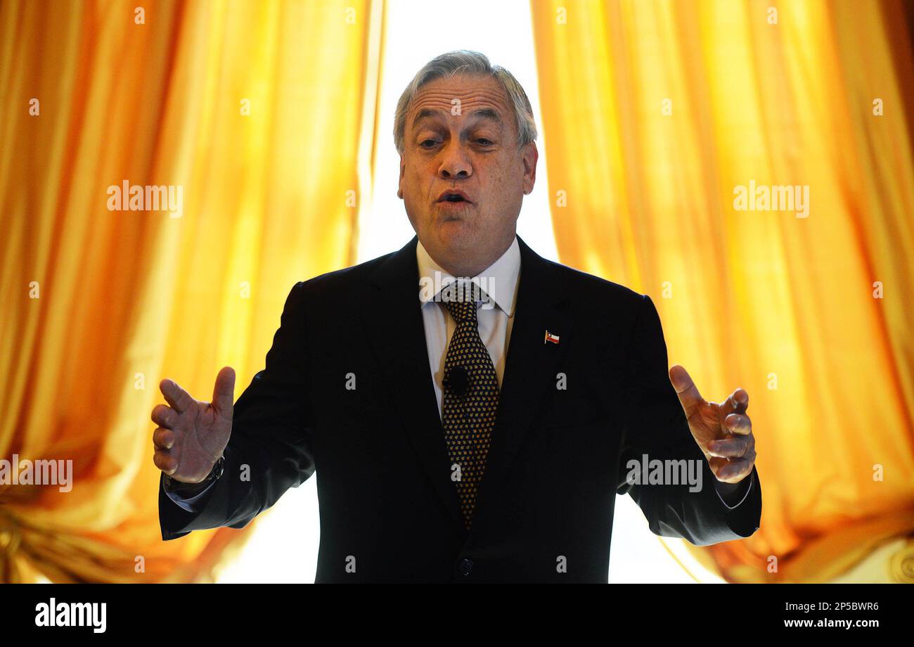 Chilean President Sebastian Pinera takes part in a round table ...