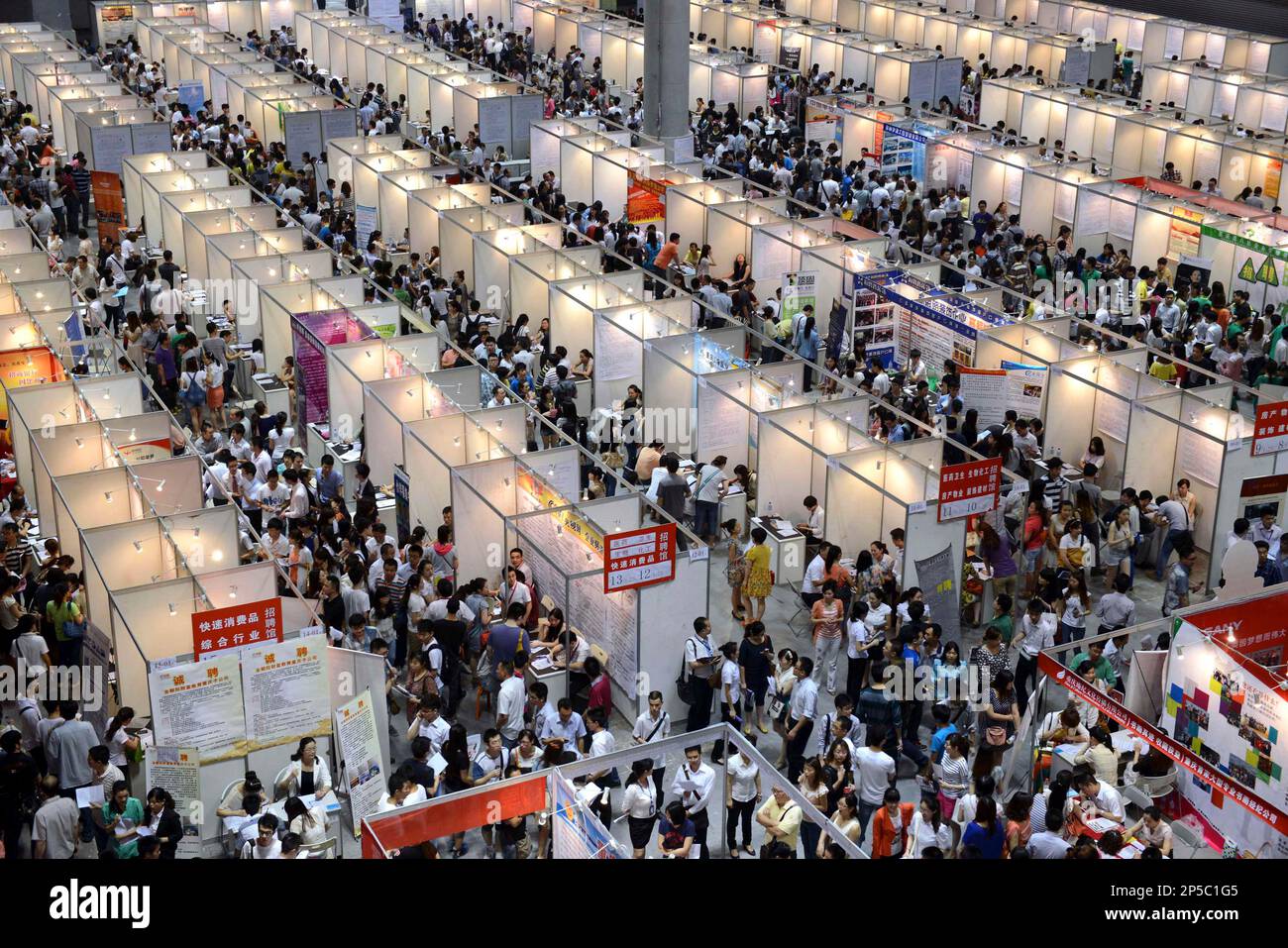 In this photo taken on May 26, 2013, Chinese job seekers visit a job ...