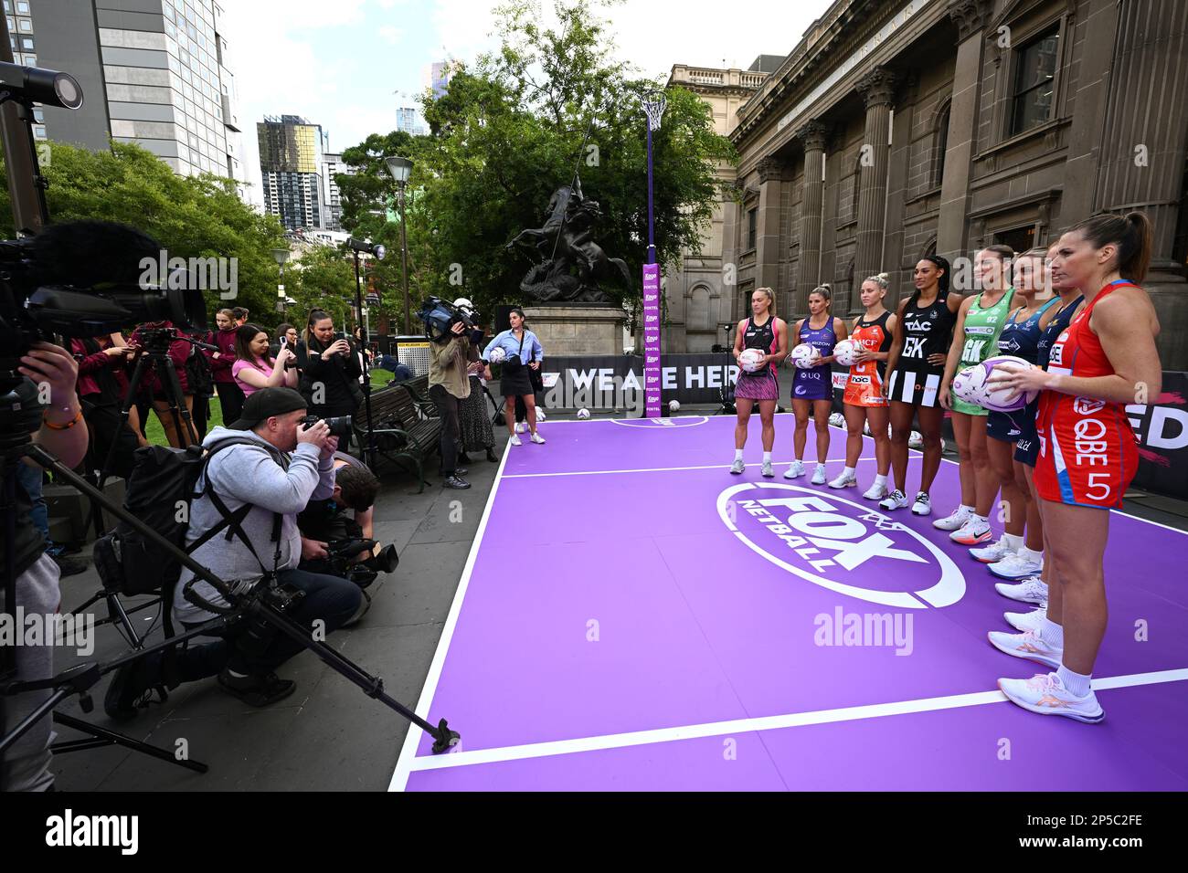 Representatives from all eight clubs pose for a photo during the Super ...