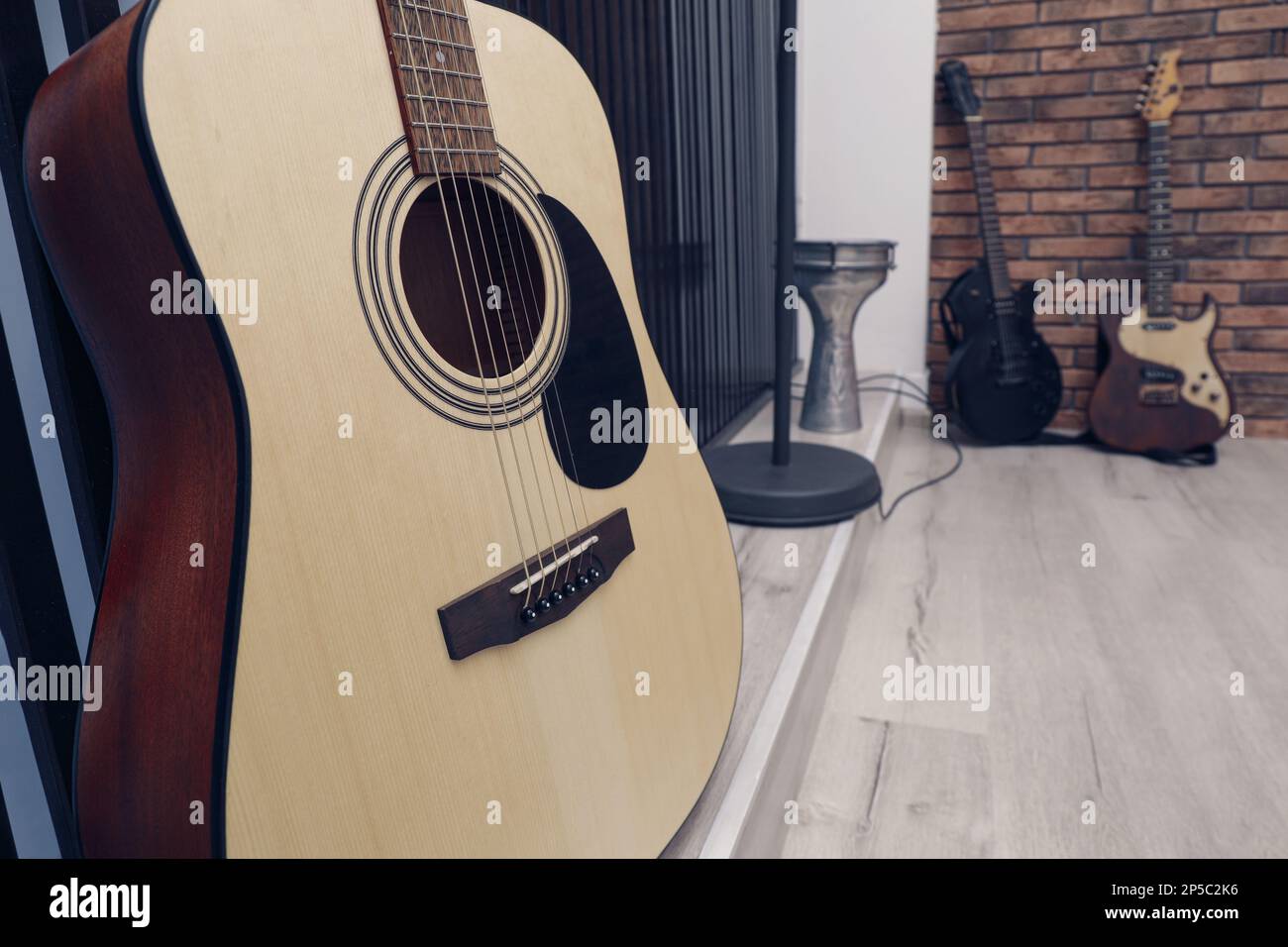 Different musical instruments indoors, focus on classical guitar Stock ...