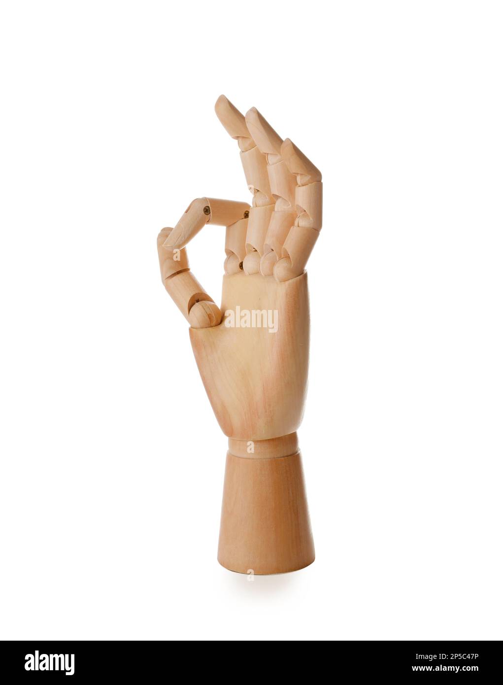 Wooden mannequin hand showing okay gesture on white background Stock ...