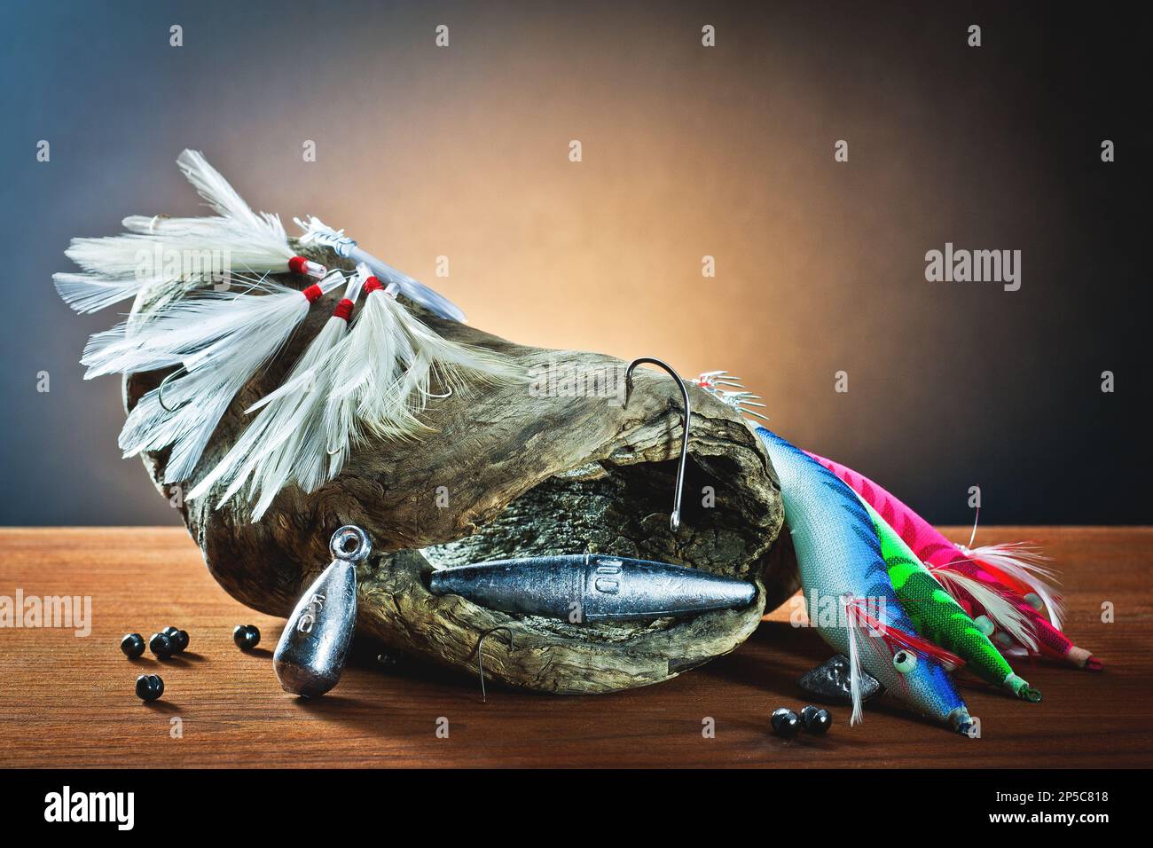 Artificial bait for fishing with hooks and sinkers on wood, for ...