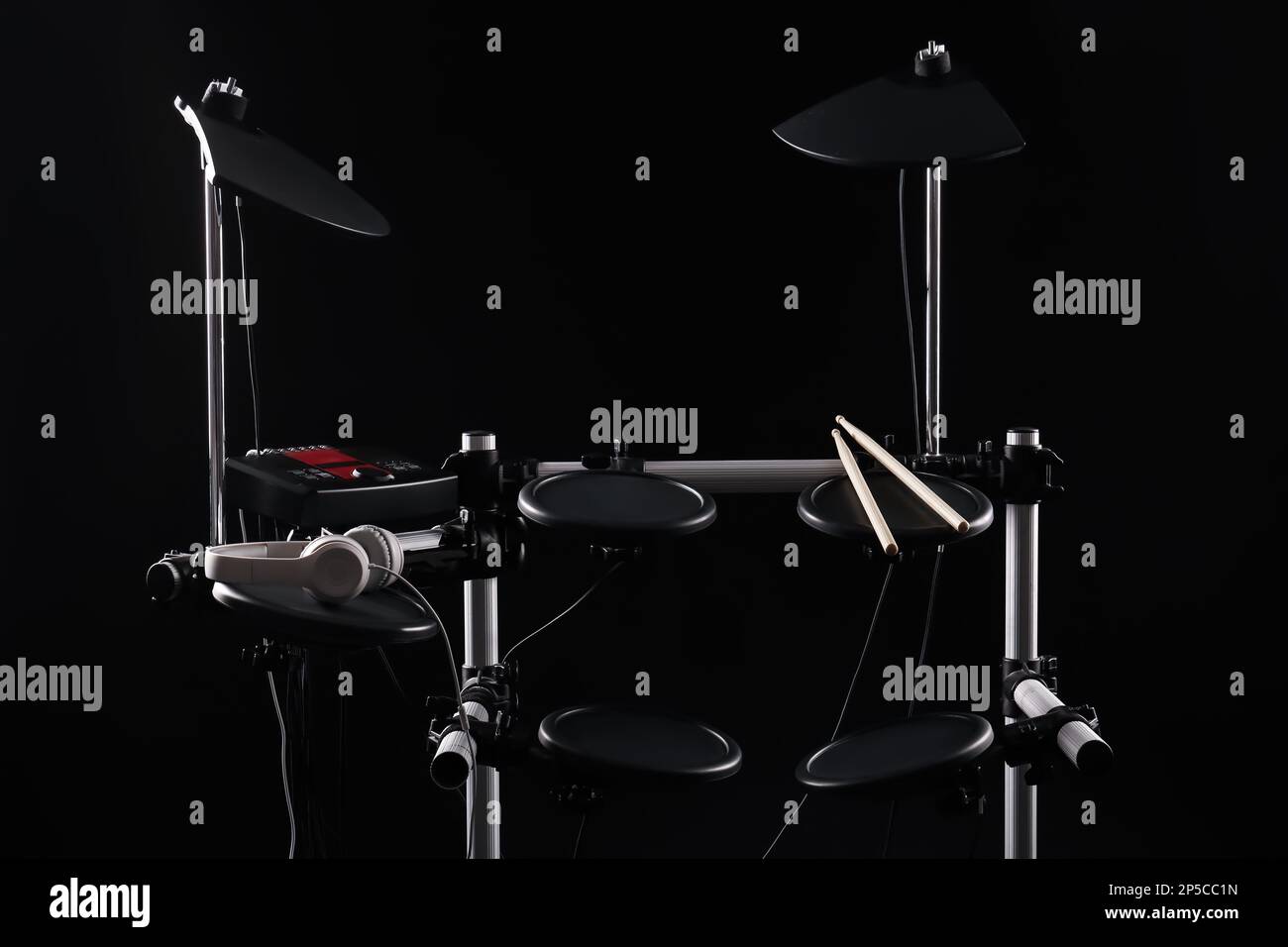 Modern electronic drum kit on dark background. Musical instrument Stock ...