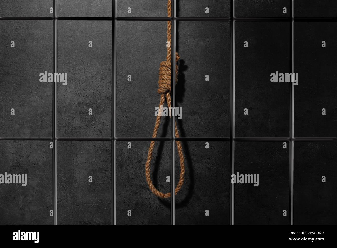 Rope noose with knot in prison cell Stock Photo - Alamy
