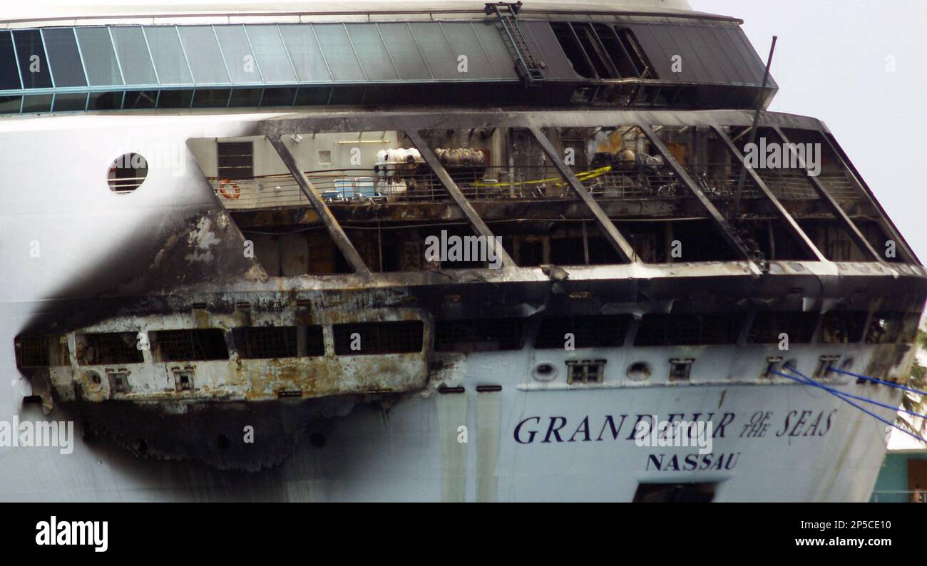 The fire-damaged exterior of Royal Caribbean's Grandeur of the Seas ...