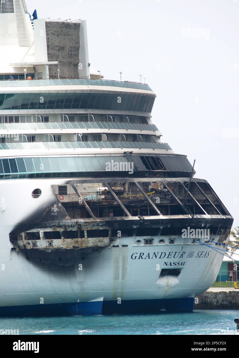 The fire-damaged exterior of Royal Caribbean's Grandeur of the Seas ...