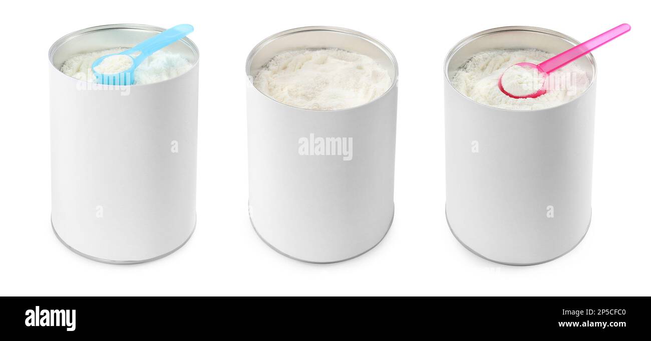 Set with cans of powdered infant formula with scoops on white ...