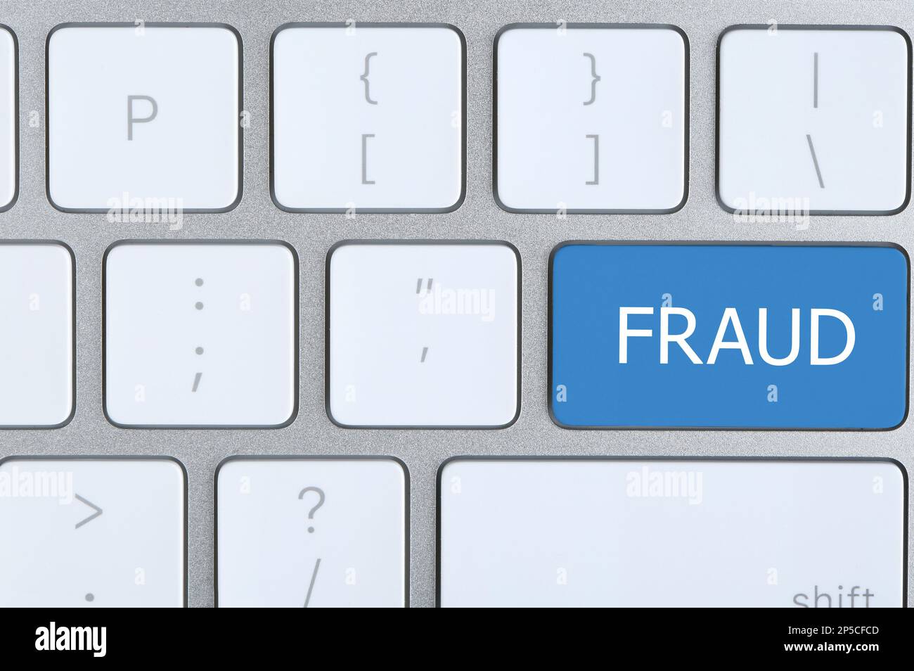 Blue button with word FRAUD on keyboard, top view Stock Photo - Alamy