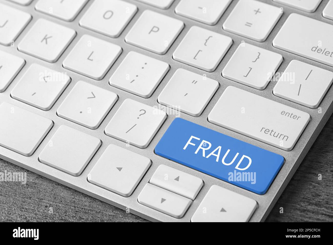 Blue button with word FRAUD on keyboard, closeup view Stock Photo - Alamy