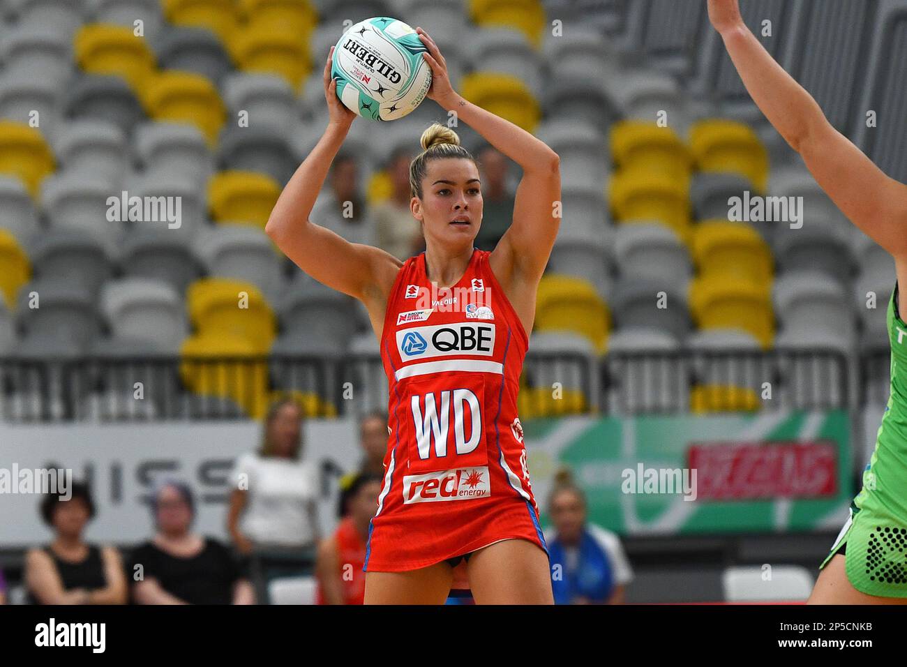 Allie Smith of the Swifts looks to pass during the Super Netball pre ...