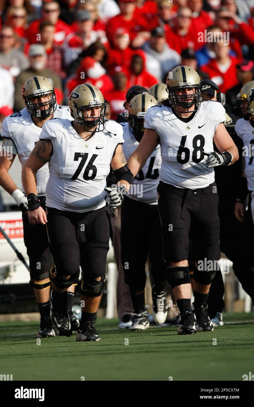 MADISON, WI - NOVEMBER 05: Rick Schmeig #76 and Dennis Kelly #68 of the ...