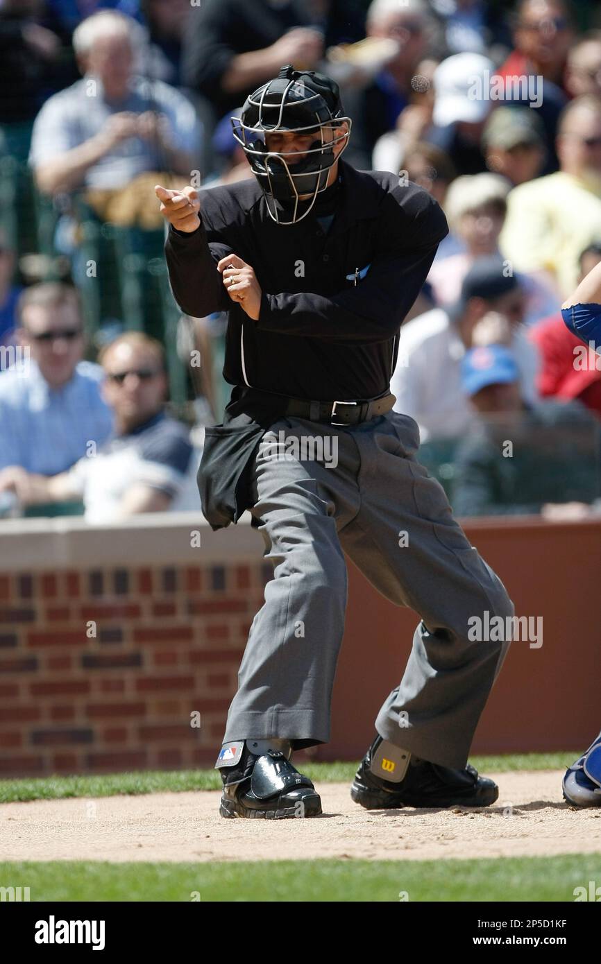 CHICAGO, IL - MAY 6: Home plate umpire Vic Carapazza #85 calls out a ...