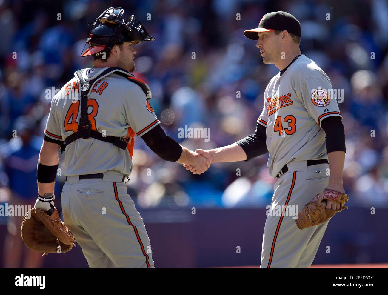 Baltimore Orioles catcher Chris Snyder, left, and pitcher Jim Johnson ...