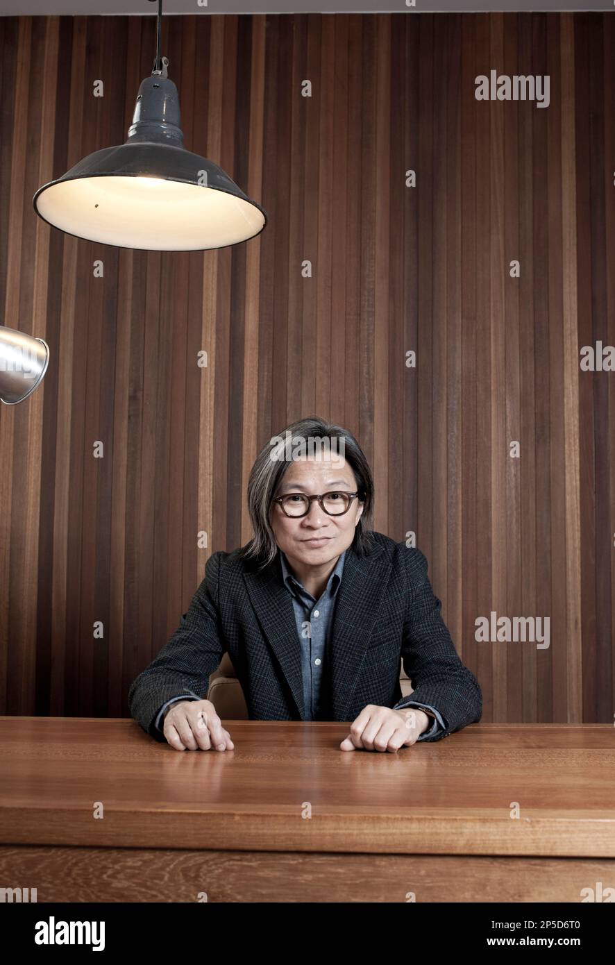 Hong Kong director Peter Chan poses for photos during an interview for ...