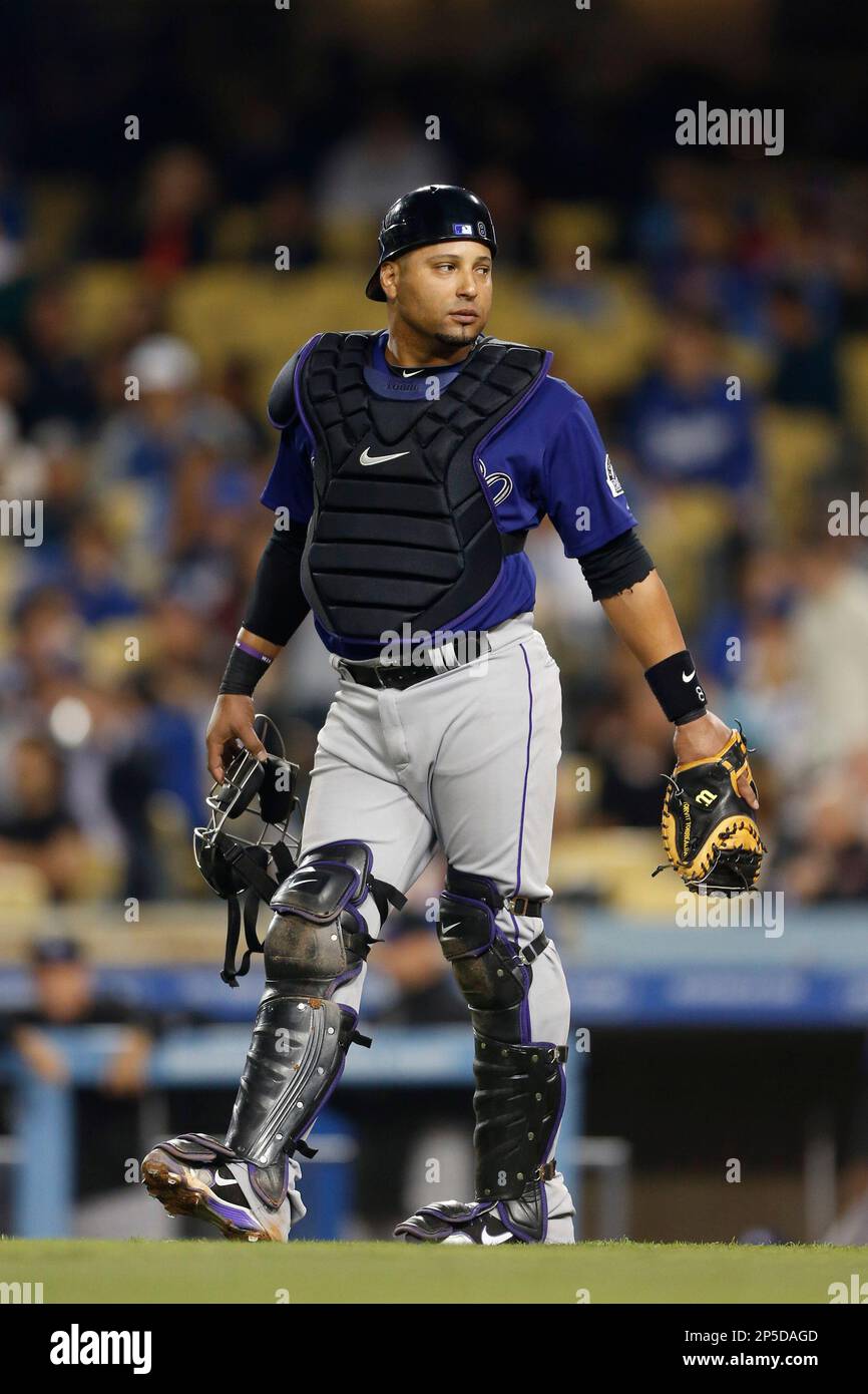 Yorvit Torrealba #8 of the Colorado Rockies during a game against the ...
