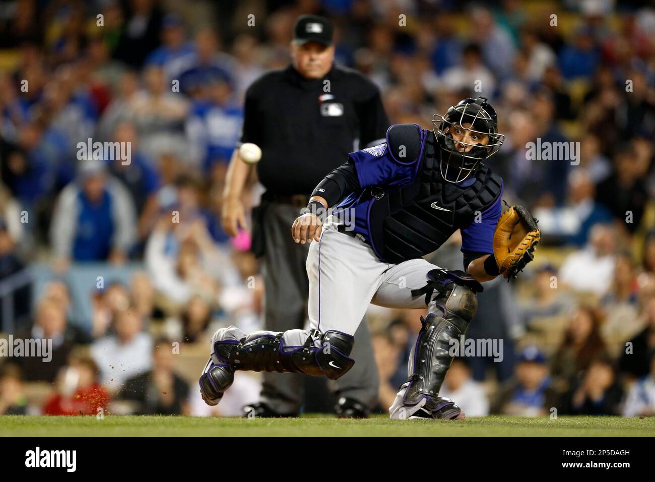 Yorvit Torrealba #8 of the Colorado Rockies during a game against the ...