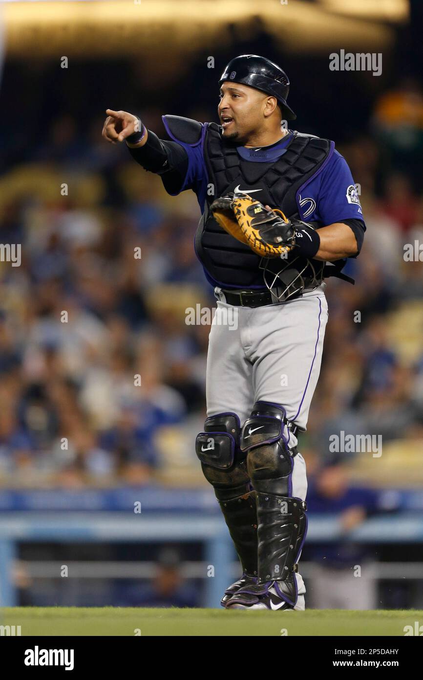 Yorvit Torrealba #8 of the Colorado Rockies during a game against the ...