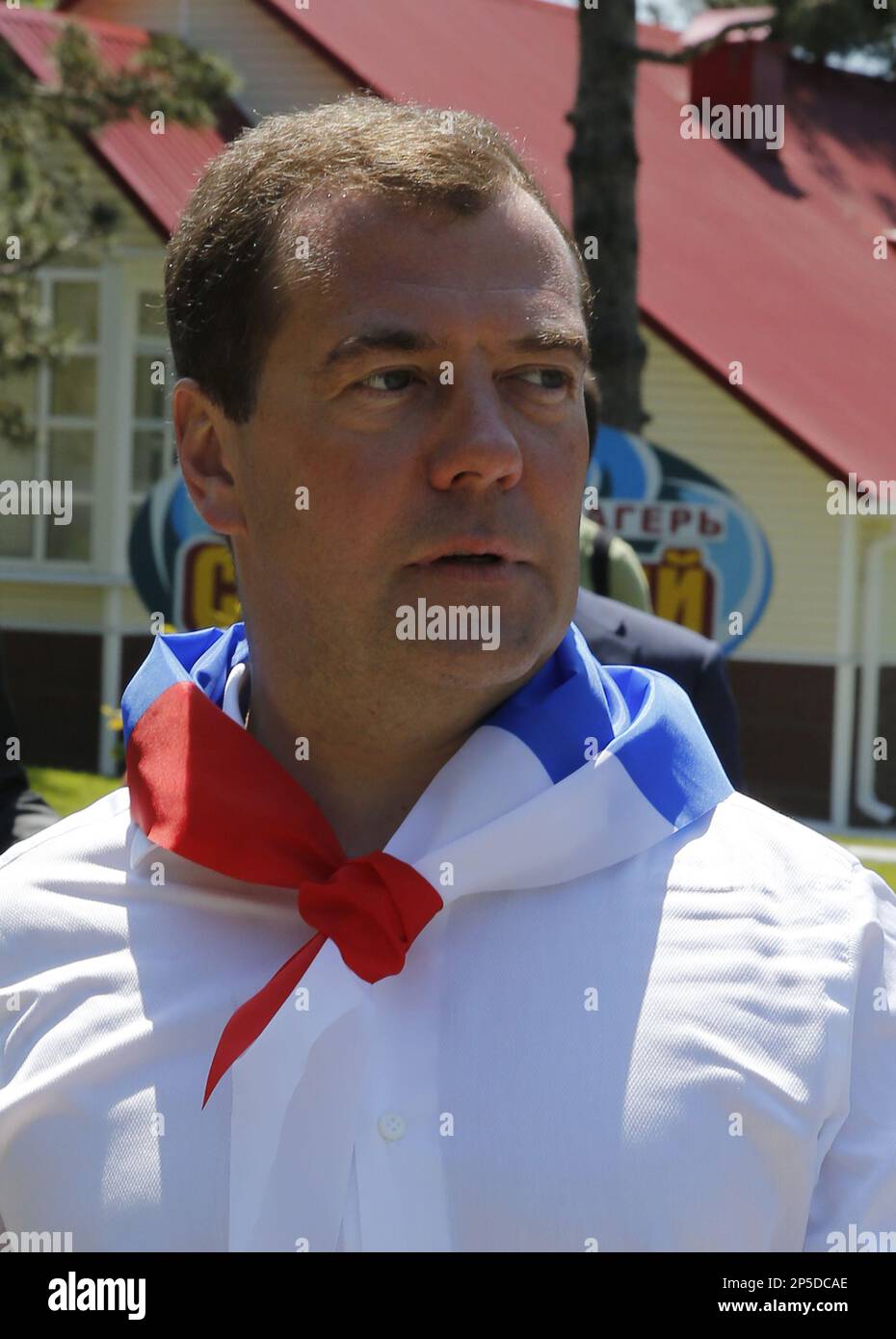 Russian Prime Minister Dmitry Medvedev wears a scarf, which children ...