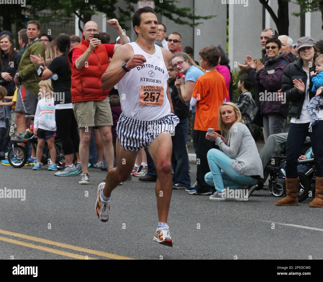 In a time of 2:32:05 Jessie Stevick of Olympia crosses the finish line ...