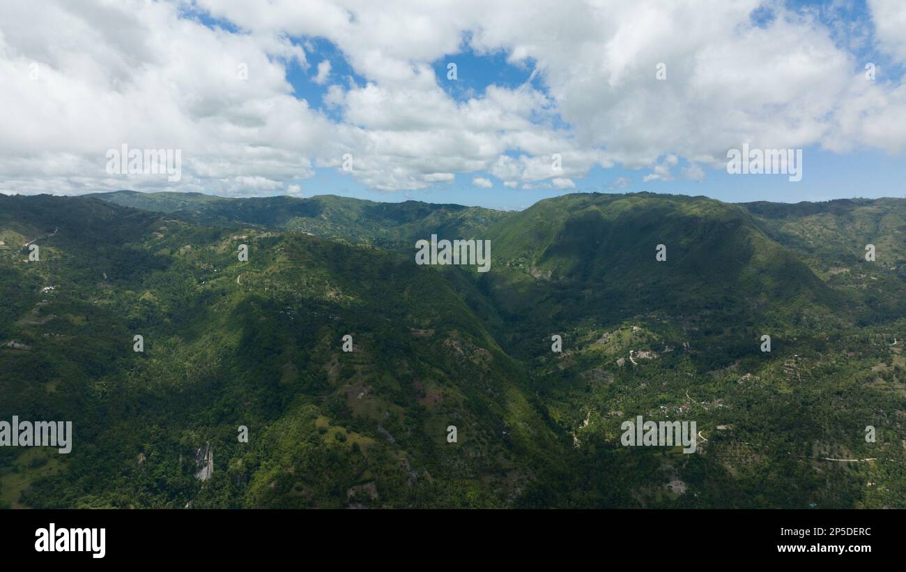 Top view of Mountain slopes with rainforest and agricultural land of ...
