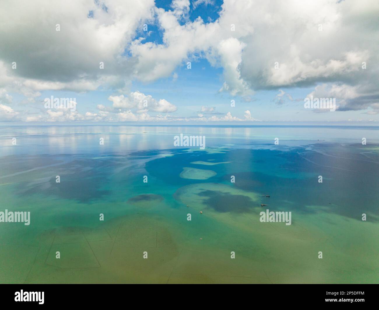 Aerial view of Bay with turquoise water and boats. Balabac, Palawan ...