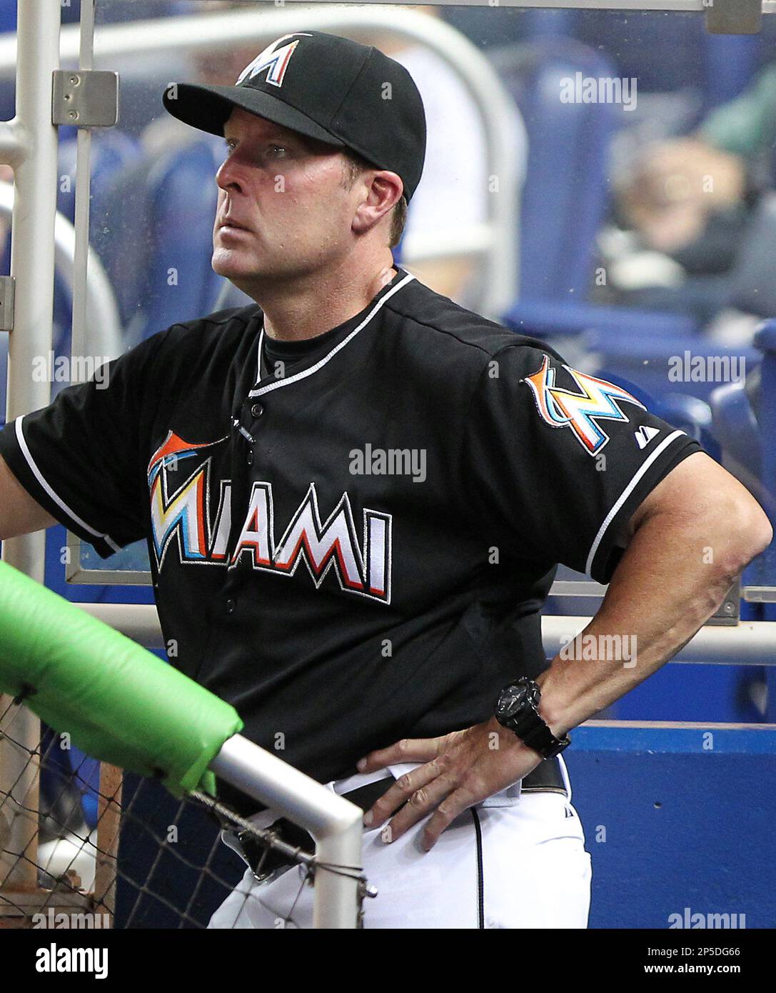 Miami Marlins manager Mike Redmond watches from the dugout during the ...