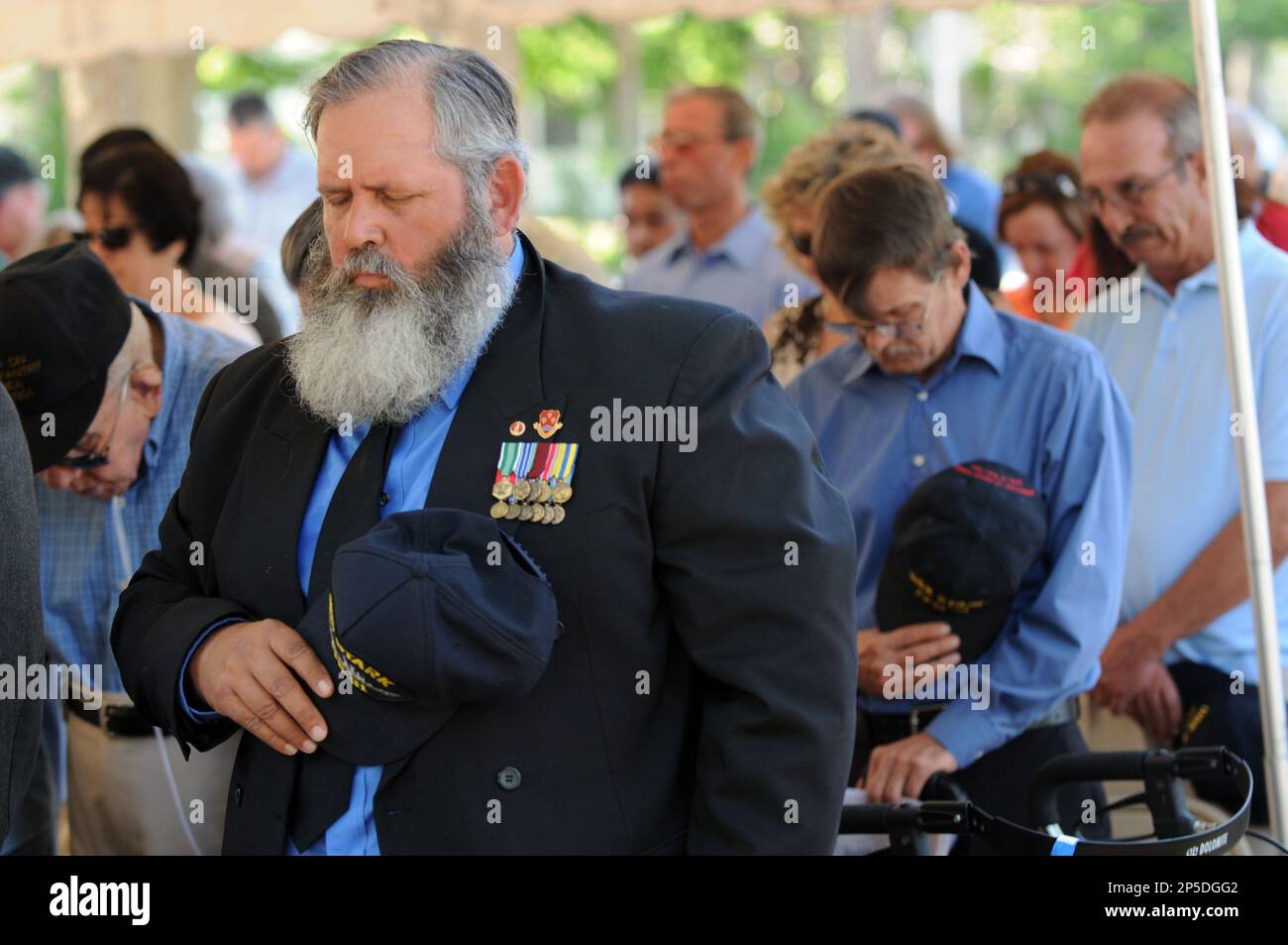 Bernard Martin, from left, a Petty Officer 3rd Class aboard the USS ...