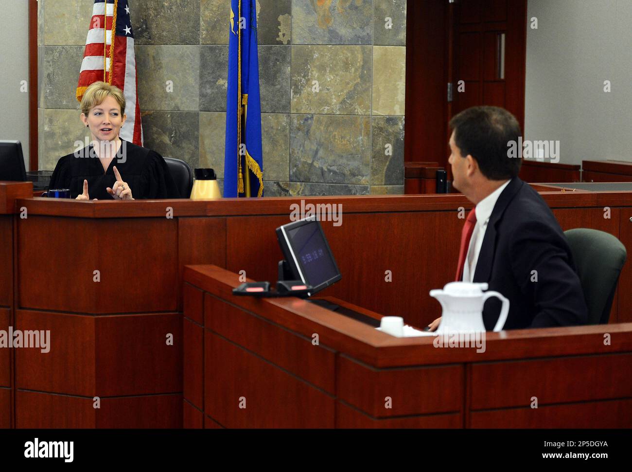 Judge Linda Marie Bell, left, talks with former O.J. Simpson defense ...