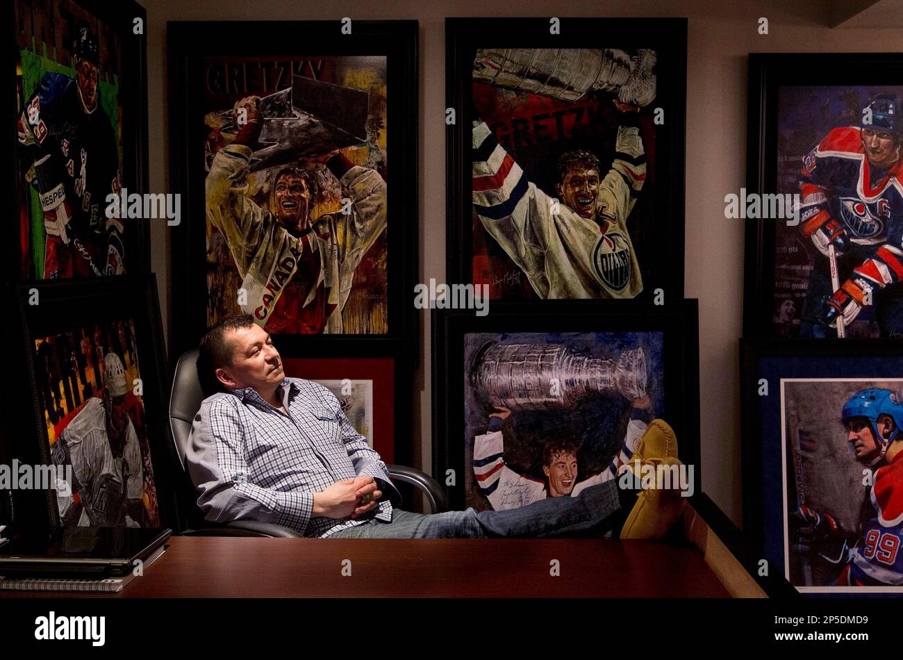 In this April 16, 2013 photo, Shawn Chaulk poses with his collection of ...