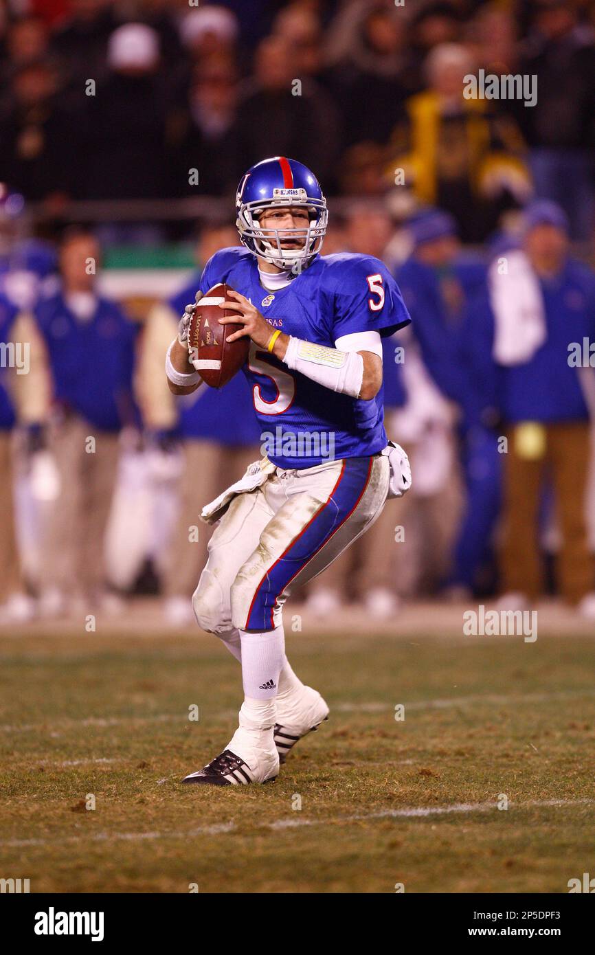 Todd Reesing #5 of the Kansas Jayhawks looks for a receiver against the ...