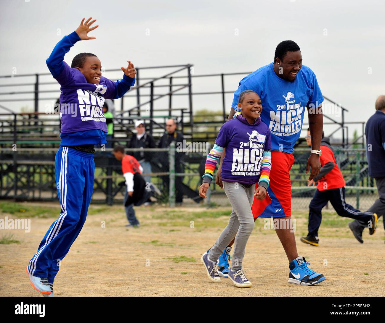 Detroit Lions defensive lineman Nick Fairley, right, celebrates his ...