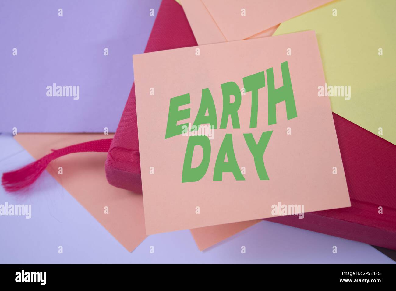 Earth Day. Text on adhesive note paper. Event, celebration reminder ...