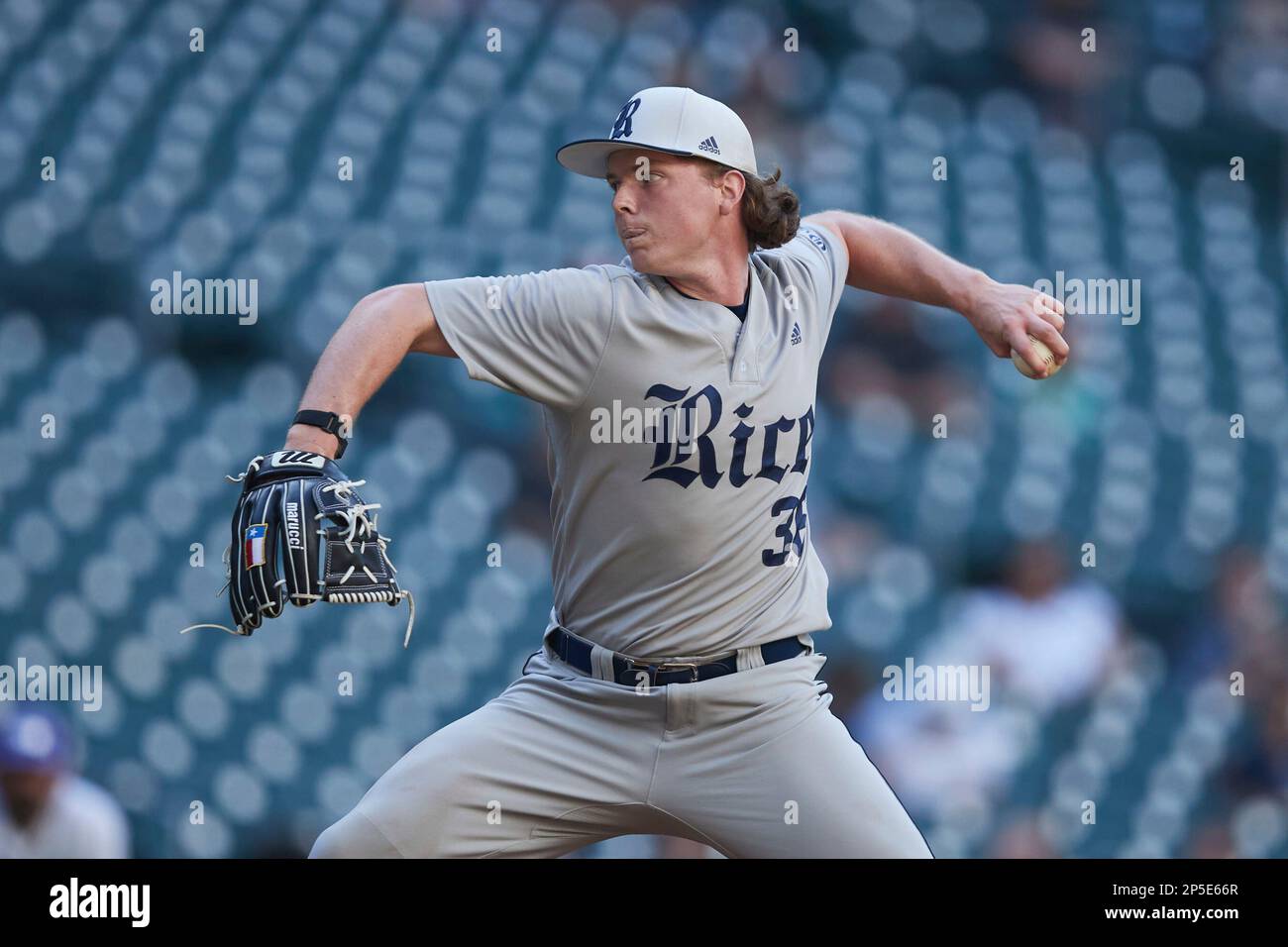 Rice Owls starting pitcher Tom Vincent (36) in action against the Texas ...