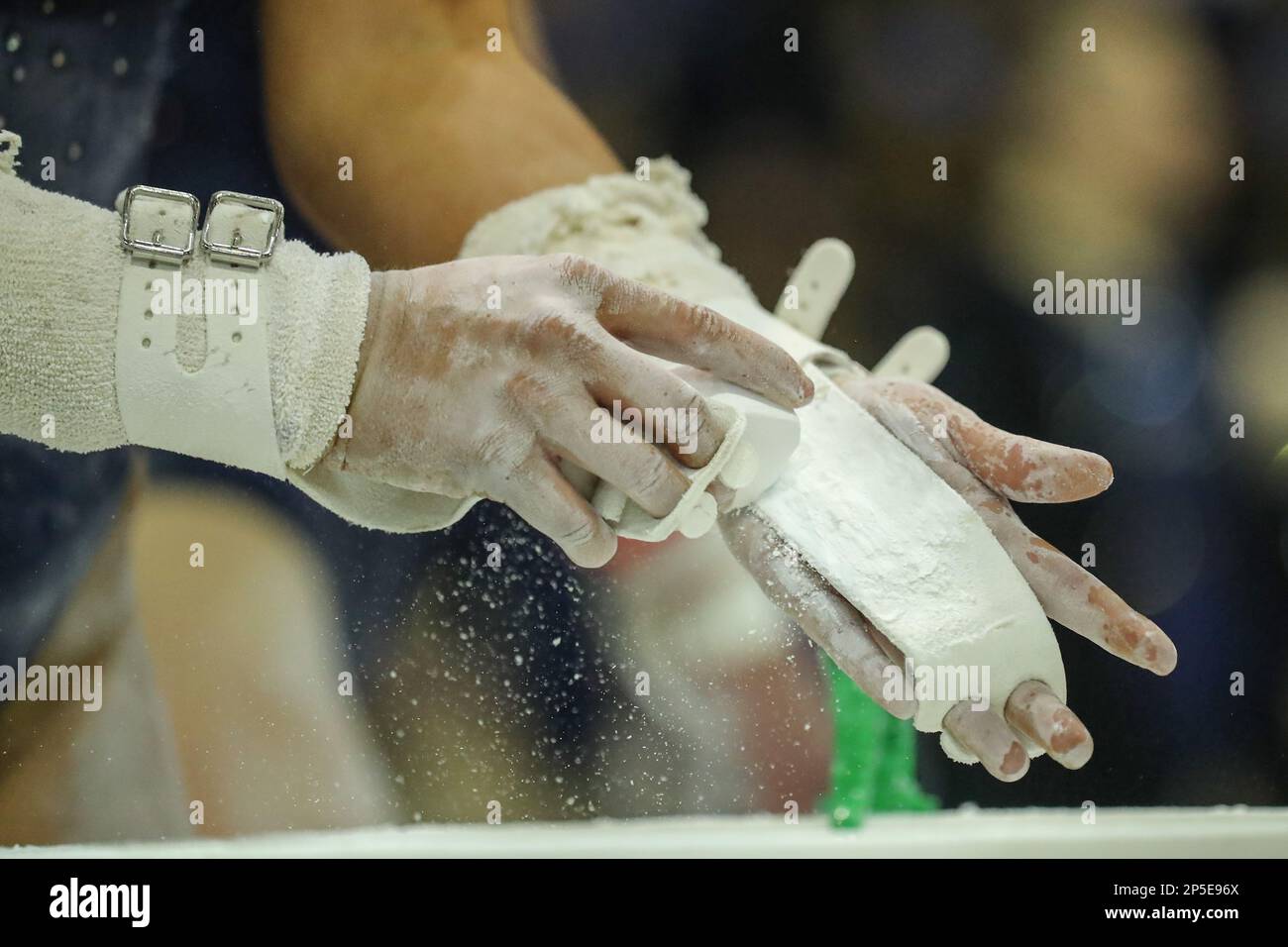 Baton Rouge, LA, USA. 3rd Mar, 2023. A gymnast chalks her hands prior ...