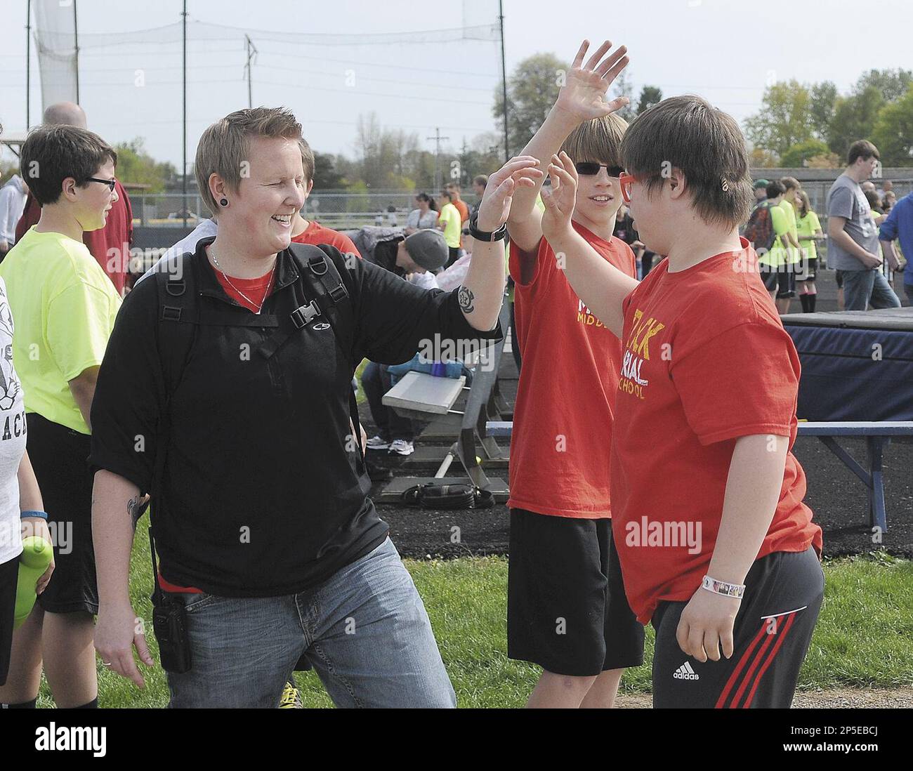 In this photo taken Tuesday, April 18, 2013, Orren Browning high fives ...