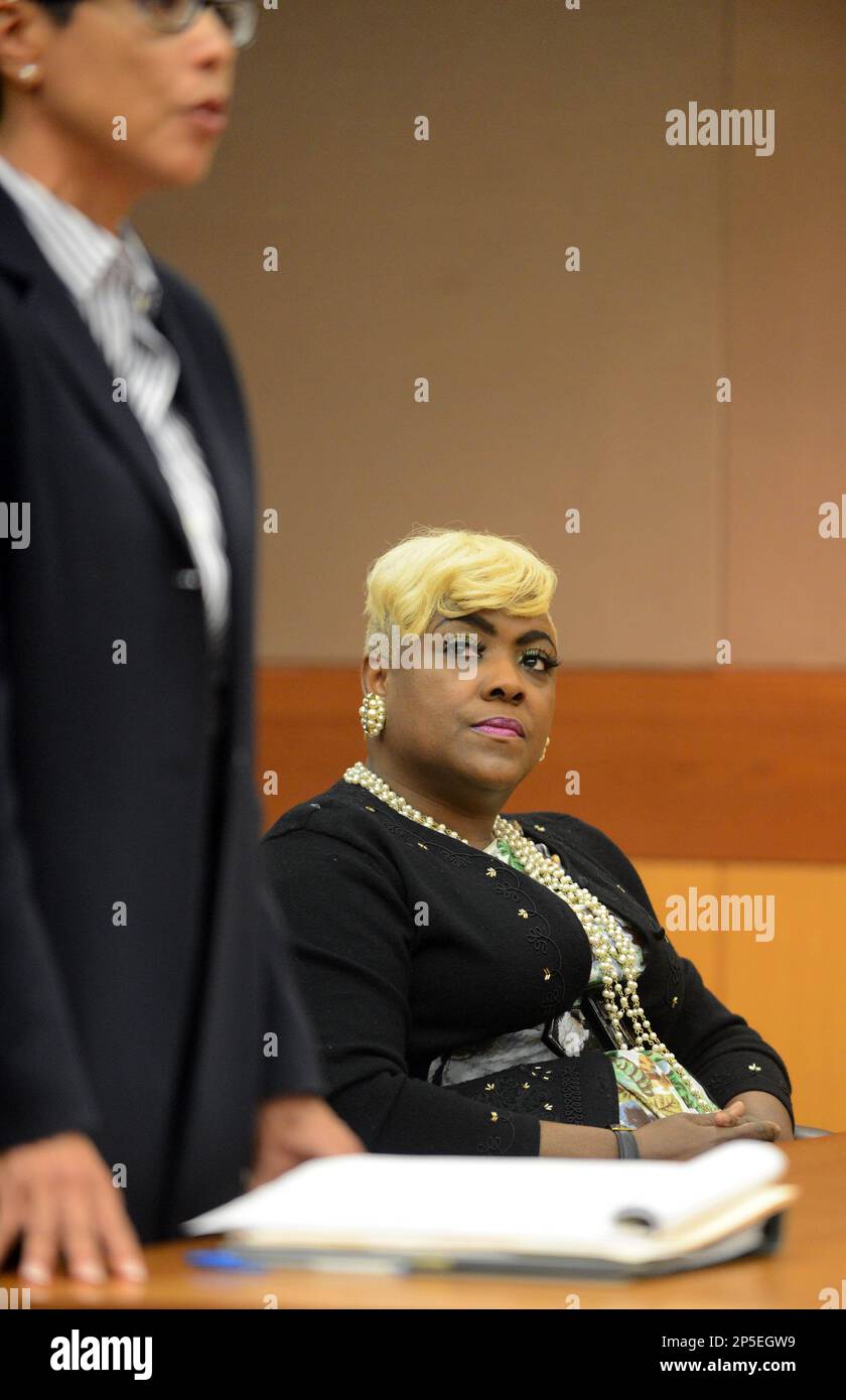 Testing coordinator Lera Middlebrooks listens as her attorney Kimberly ...