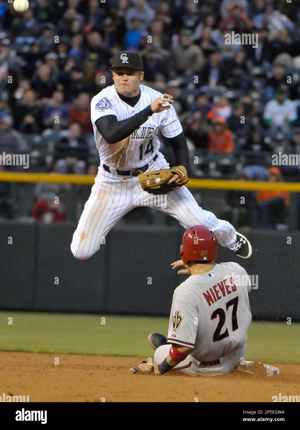 Colorado Rockies Josh Rutledge (14) during a game against the Arizona ...
