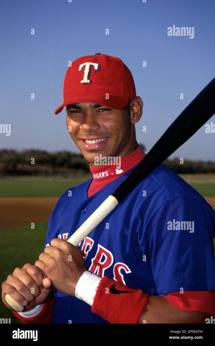 Texas Rangers first baseman Carlos Pena poses for a photo at the ...