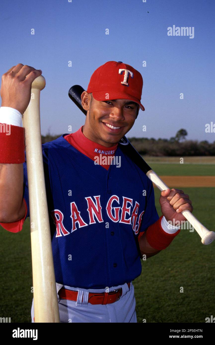 Texas Rangers first baseman Carlos Pena poses for a photo at the ...
