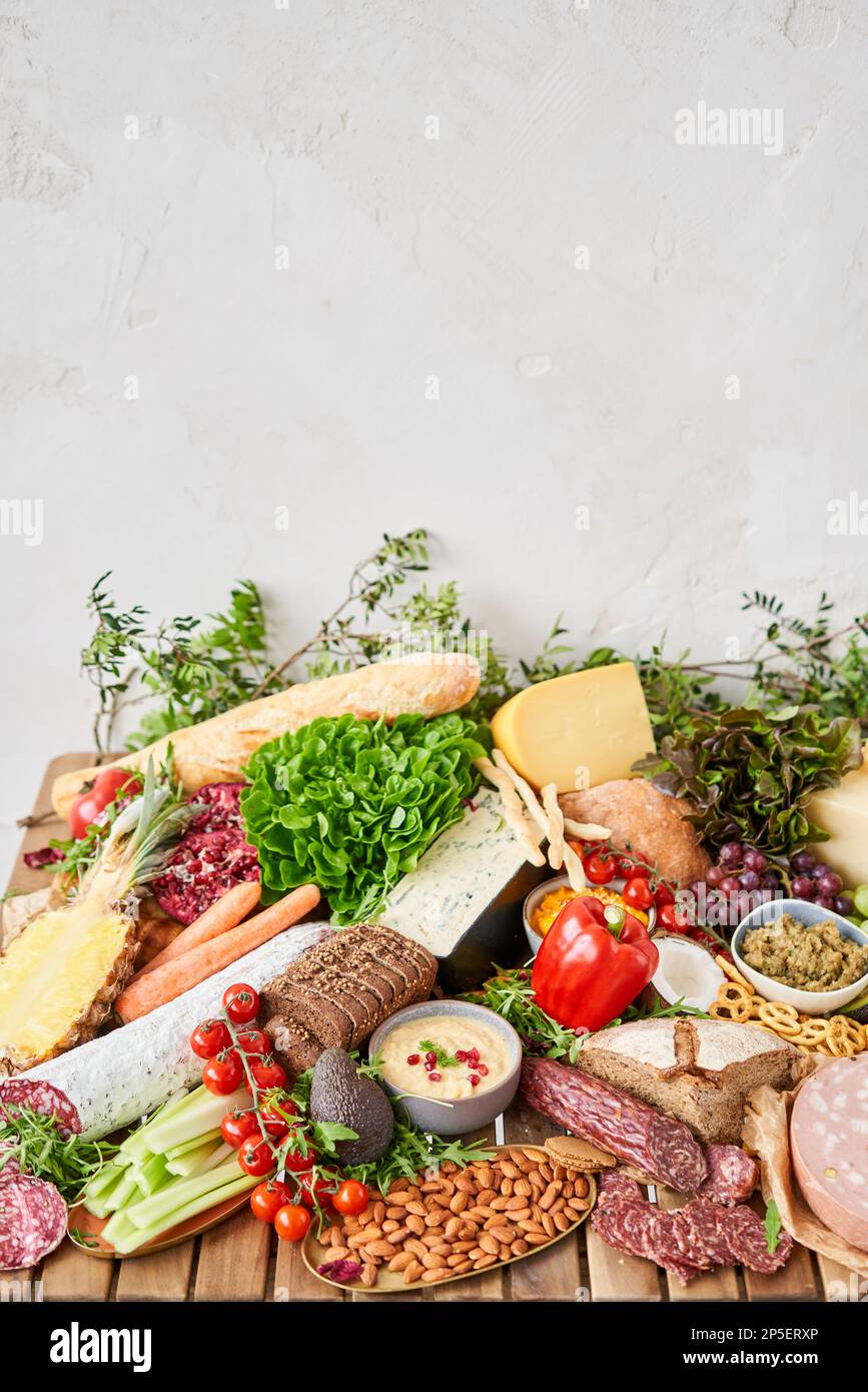 Table full of mediterranean appetizers, tapas or antipasto. Assorted ...