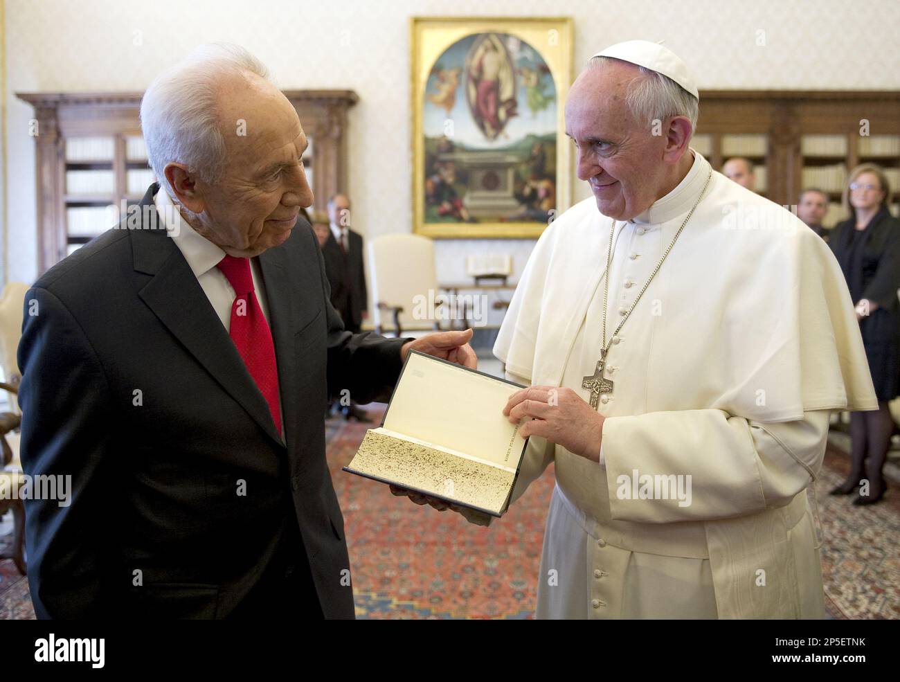Pope Francis, right, receives a Jerusalem Bible as a gift from Israeli ...