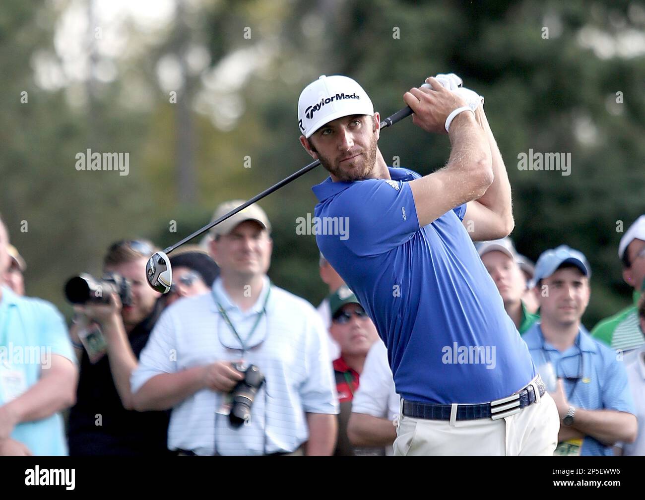 Dustin Johnson plays golf during a 2013 Masters practice round at ...