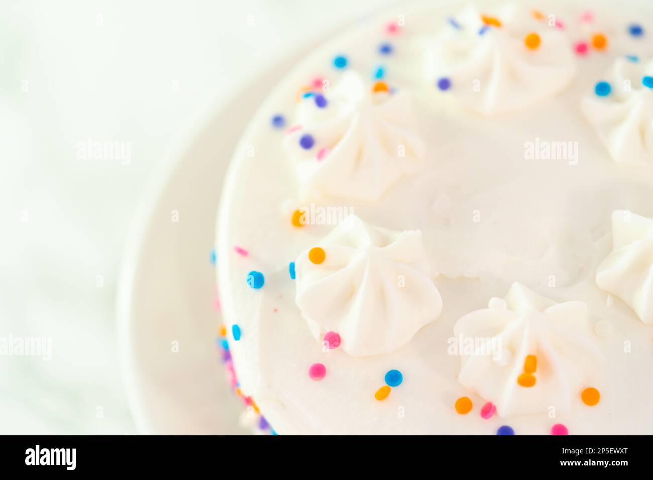 Birthday cake with funfetti sprinkles Stock Photo - Alamy