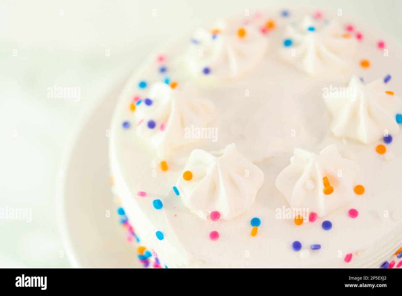 Birthday cake with funfetti sprinkles Stock Photo - Alamy