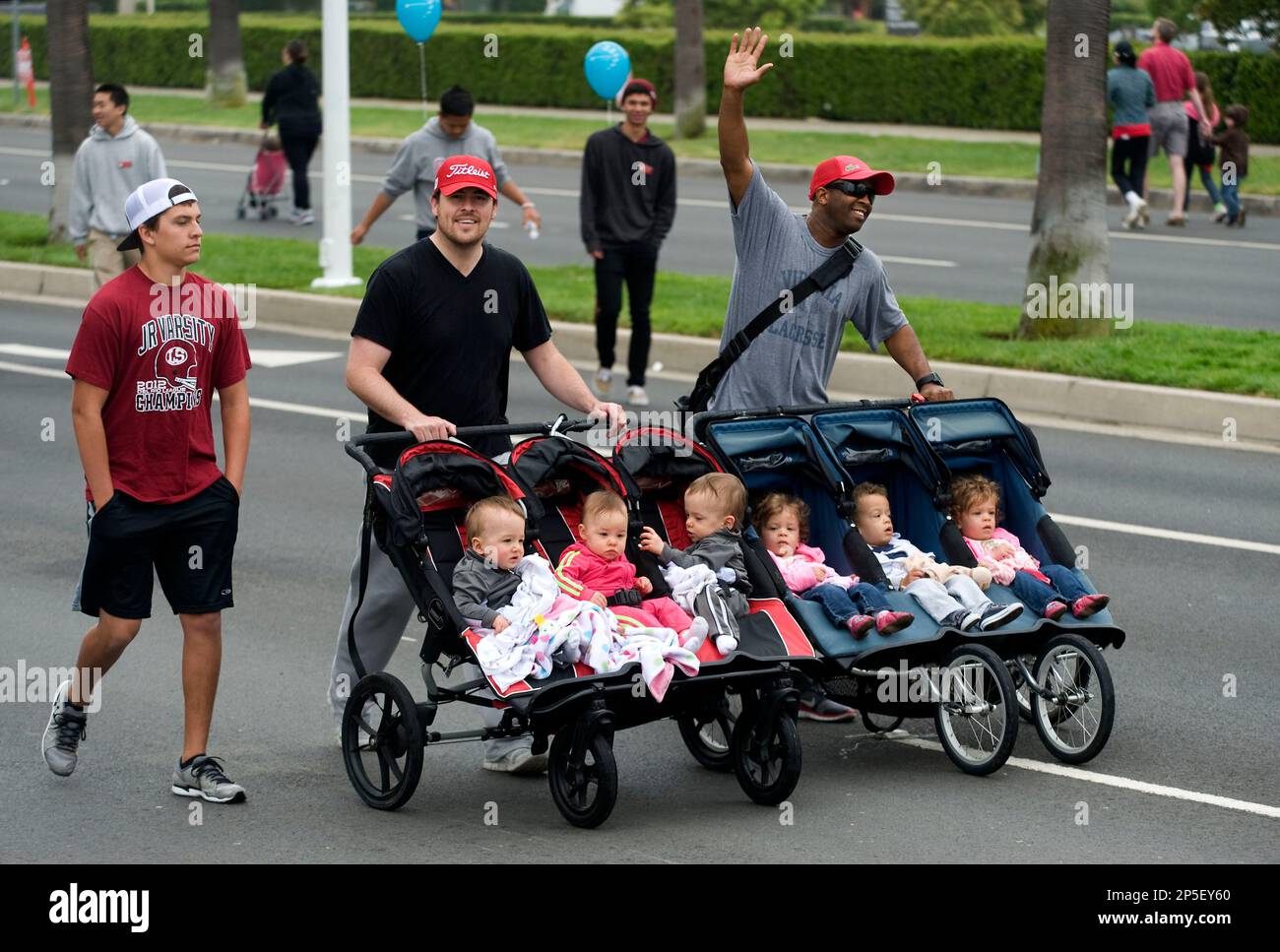 David Bravo, top right, pushes 16-month-old triplets Diego, Sofia and ...
