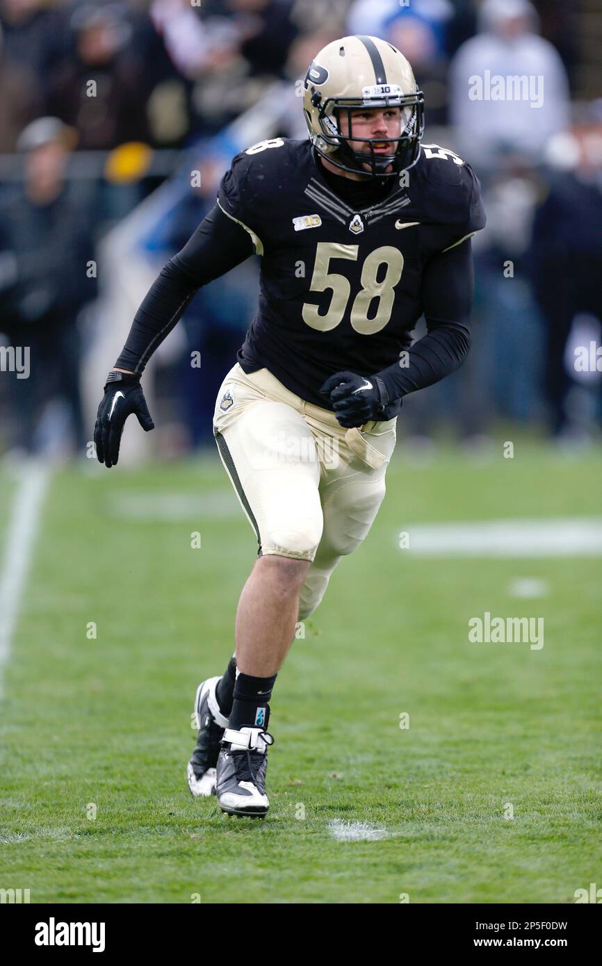 Purdue defensive end Robert Maci (58) runs during a NCAA college ...
